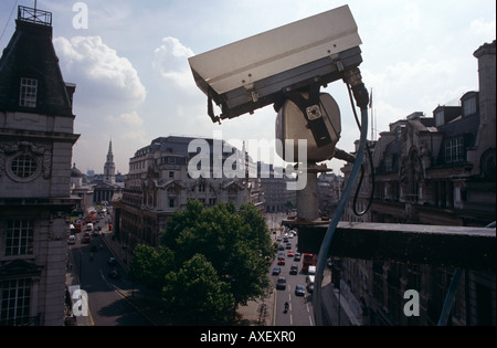 CCTV security camera on rooftop watches over pedestrianized area in ...