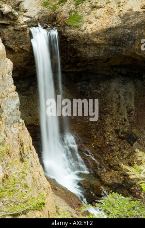 The Crypt Lake Falls plunge off a cliff in Waterton Lakes National Park ...