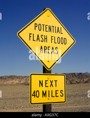 Flash flood warning sign next to Los Angeles River, Long Beach ...