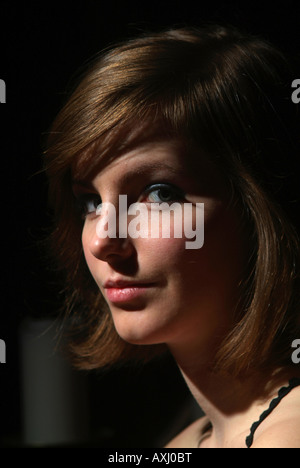 A low key headshot picture of beautiful woman Stock Photo - Alamy