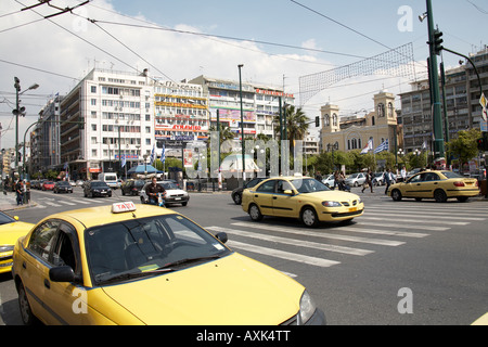 Yellow Greek taxi cab in Athens, Greece Stock Photo - Alamy