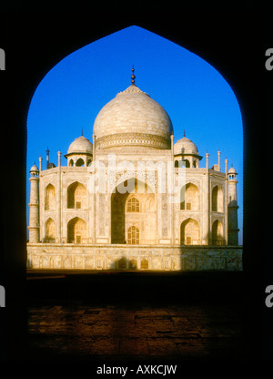 Looking at the Taj Mahal through a window in the Agra Fort in Agra ...