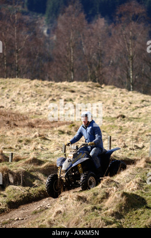 Quad bike riding and instruction in Dunkeld Scotland 12 03 2008 Stock ...