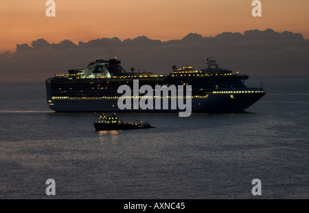 Closeup of Cruise ship entering Cabo san Lucas Bay in early morning ...