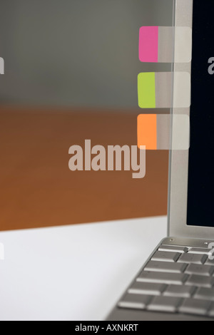 Laptop with adhesive notes Stock Photo - Alamy