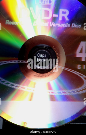 DVD hole around caps lock light diffraction spectrum colours disc audio ...