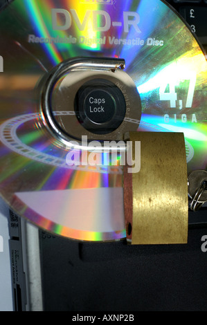 DVD hole around caps lock light diffraction spectrum colours disc audio video with padlock Stock ...