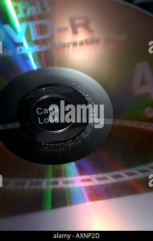 DVD hole around caps lock light diffraction spectrum colours disc audio ...