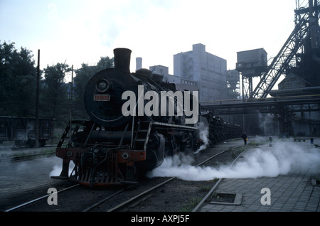 A steam train at the factory of Benxi Iron and Steel Group in Liaoning ...