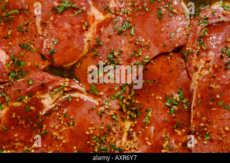 Marinating rib eye steaks Stock Photo - Alamy