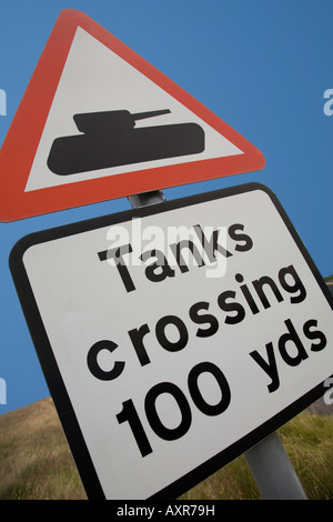 Road warning triangle of tanks crossing in UK Stock Photo - Alamy
