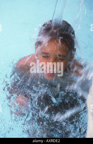 kid getting water dumped on his head Stock Photo - Alamy