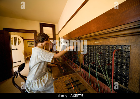 Telephone operator working at switchboard Stock Photo: 51556497 - Alamy