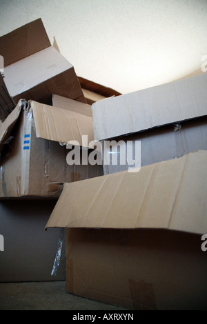 A Big Stack of Empty Moving Boxes Unpacked in a New Home Stock Photo ...