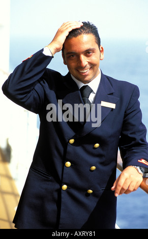 Man steward on ship board at night in miami, usa. Macho in suit jacket ...