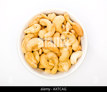 overhead view of cashew nuts in a bowl on table Stock Photo - Alamy