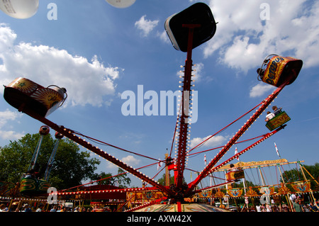 Rotating fun scary fairground ride Stock Photo - Alamy