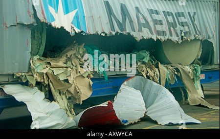 Damaged sea container at the Port of Felixstowe, Suffolk, UK Stock ...