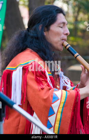 Native Peruvian Indian playing recorder-like wind instrument at Pisac ...