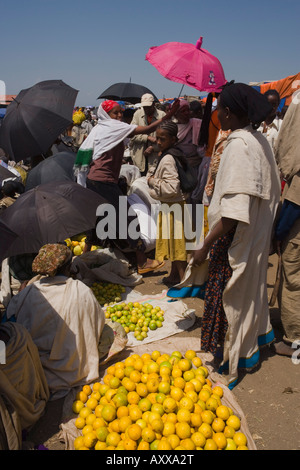 Ethiopian women buy and sell goods at a street market in Mekelle in the ...