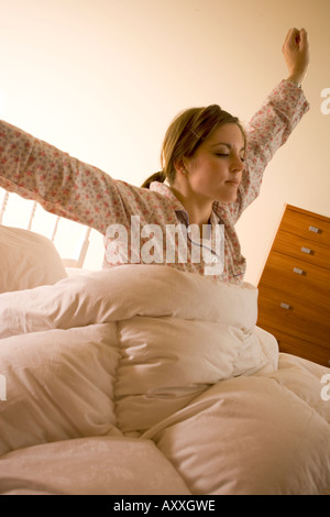 Wake up and stretch. Warm up your muscles with stretch first thing in ...