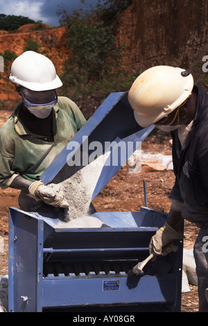 Grade control sampling in surface gold mine opencast pit with geologist ...
