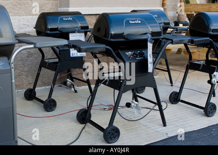 lawn care lawn and garden colorful gas grill cookout Stock Photo - Alamy