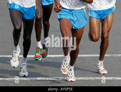 Marathon running race, runners feet on road Stock Photo - Alamy
