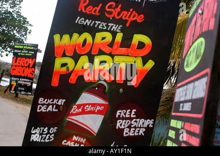 Colourful Hand Painted Signs for Jamaican Parties Stock Photo - Alamy