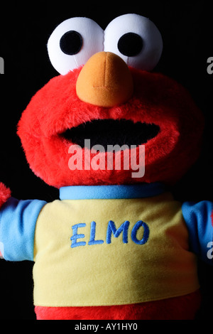 Elmo the muppet figure from Sesame Street red soft cuddly toy on white ...