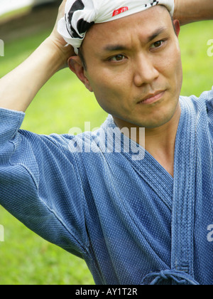 Close up of Japanese man looking at camera Stock Photo - Alamy