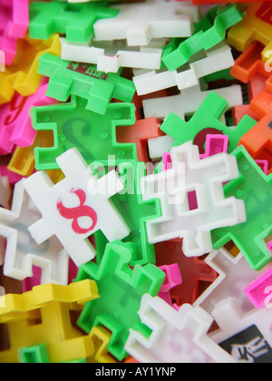 Pieces of jigsaw puzzle on color background Stock Photo - Alamy