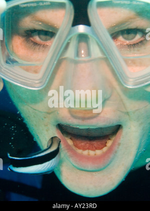 A diver is cleaned by Cleaner Wrasse Labroides dimidiatus in the Red ...