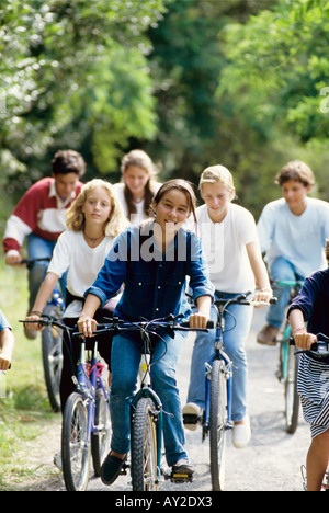 GROUP OF 8 CHILDREN AND TEENAGERS RIDING BIKES Stock Photo - Alamy