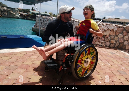 Dolphin therapy Lucas Knecht who is mentally and fysically disabled in ...