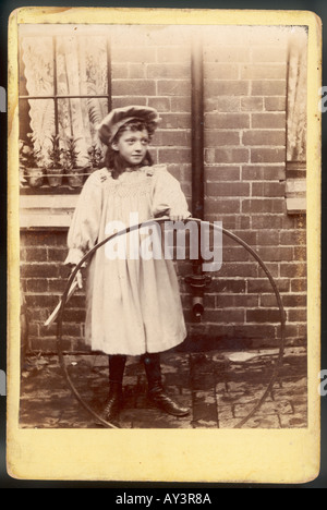 GIRL & HER HOOP/ 1895 Stock Photo - Alamy