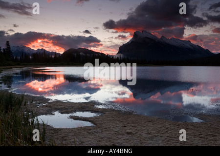Sunset at Mount Rundle overlooking Banff township seen from the shore ...