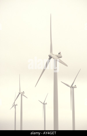 The wind turbines in the fog Stock Photo - Alamy