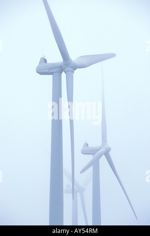 The wind turbines in the fog Stock Photo - Alamy