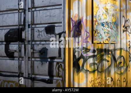 Colorful graffiti sprayed onto an old 20ft cargo container Stock Photo ...
