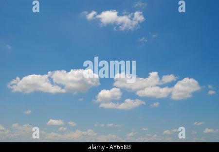 white clouds on a blue sky background Stock Photo - Alamy
