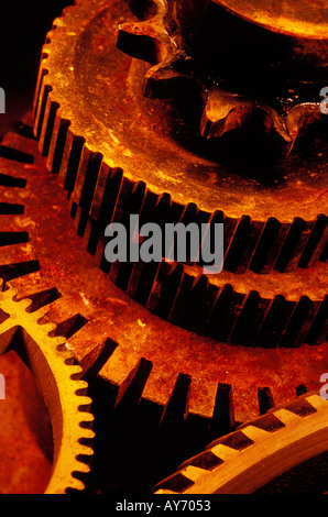 Old metal gears in drive mechanisms. Rusty gears used in machines from ...