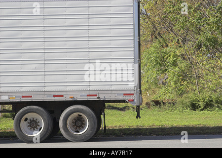 The back end, rear of semi trailer prime mover trucks showing the ...