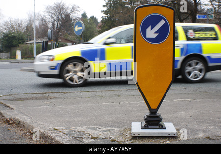 Keep left bollard on roundabout in Edinburgh, UK Stock Photo - Alamy