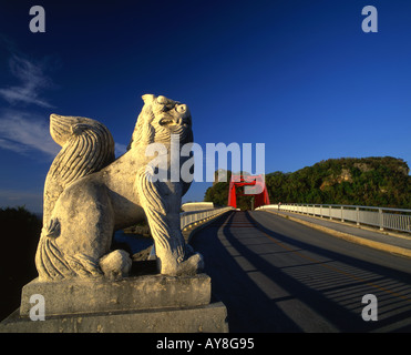 Shisa stands at the entrance to the Ikei Island Bridge, Okinawa Stock ...