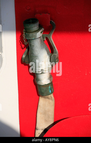 Fire hose on a ship Stock Photo - Alamy