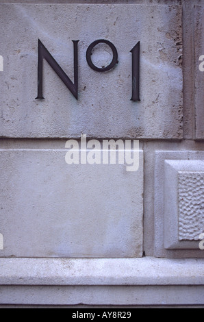 "Number 1 brass numeral on stone, England Stock Photo - Alamy
