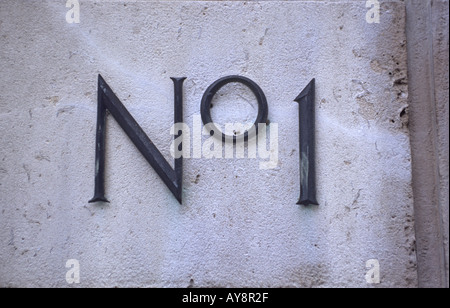 "Number 1 brass numeral on stone, England Stock Photo - Alamy