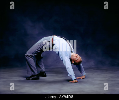 A man bending over backwards Stock Photo - Alamy