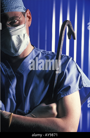 Humorous Spoof photograph of An overzealous surgeon With a crowbar ...